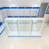 China Pharmacy Retail Display Rack and Medical Wall Cabinet Solutions for Modern Drugstore Store Interior Design for sale