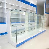 China Pharmacy Retail Display Rack and Medical Wall Cabinet Solutions for Modern Drugstore Store Interior Design for sale