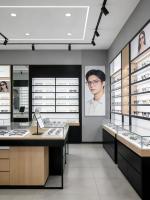 China Contemporary Wooden Optical Display Cabinets Custom Eyewear Showcase with LED Lights for sale