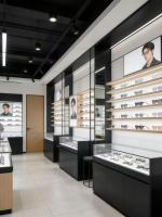 China Contemporary Wooden Optical Display Cabinets Custom Eyewear Showcase with LED Lights for sale