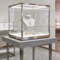 China Factory Direct High Gloss Metal Frame Jewelry Display Cabinet LED Lighted Showcase for sale
