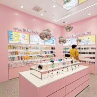 China Custom Display Counter Modern Acrylic Cosmetic Showcase Shelves for Retail Shop Pharmacy Store Beauty Products Display Stand for sale