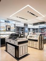 China Creative Eco-Friendly Cosmetic Display Cabinet LED Heavy Duty Retail Makeup Store Fixtures for Professional Beauty Shop for sale