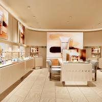 China Custom Modern Wooden Cosmetic Display Counter with LED  Beauty Product Showcase  for Contemporary Cosmetic Store Interior Design for sale