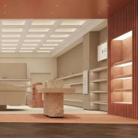 China Modern Wooden Beauty Display Cabinet with LED Illumination - Tailored for Contemporary Cosmetic Shop Design for sale