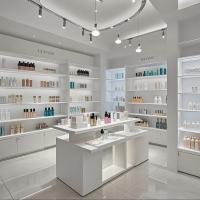 China Custom Cosmetic Display Cabinet with LED Lighting - Retail Makeup Racks & Island Stands for Shops for sale