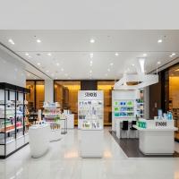China Custom Cosmetic Display Retail Cabinet Led Makeup Display Racks Cosmetic Island Display Stand for Cosmetic Shops - for sale