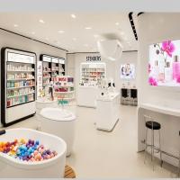China Custom Cosmetic Display Retail Cabinet Led Makeup Display Racks Cosmetic Island Display Stand for Cosmetic Shops - for sale
