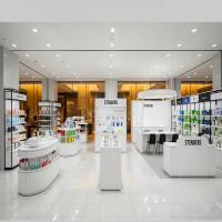 China Custom Cosmetic Display Retail Cabinet Led Makeup Display Racks Cosmetic Island Display Stand for Cosmetic Shops - for sale