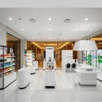 China Custom Cosmetic Display Retail Cabinet Led Makeup Display Racks Cosmetic Island Display Stand for Cosmetic Shops - for sale