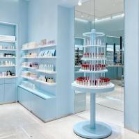 China Custom Retail Cosmetic Display Shelf With Led Lighting Fashion Cosmetic Store Design for Perfume Shop Decoration for sale