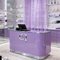 China Professional Cosmetic Display Furniture: Custom LED Makeup Cabinets, Rotating Display Racks & Center Island Stands for sale