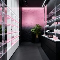 China Pink LED Illuminated Wooden Cosmetic Display Shelf  Custom Beauty Shop Showcase, Skincare Wall Cabinet for sale