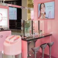 China Pastel Pink Makeup Display Kiosk, Custom Design for Beauty Salon & Shopping Mall for sale