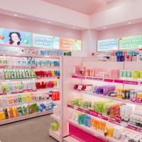 China BX Custom Makeup Display Shelf LED Cosmetic Showcase Retail Display Stand Rack Shelves for Cosmetics Shop for sale