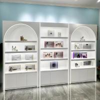 China Private Customization Makeup Perfume Shop Design Furniture Store Baking Paint Beauty Perfume Tall Display Cabinet for sale