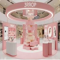 China Custom Pink Makeup Display Booth  LED Cosmetic Showcase Kiosk for Cosmetics Shop Retail for sale