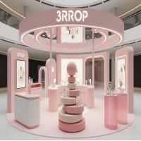 China Custom Pink Makeup Display Booth  LED Cosmetic Showcase Kiosk for Cosmetics Shop Retail for sale