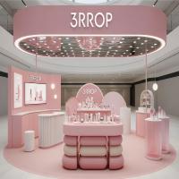 China Custom Pink Makeup Display Booth  LED Cosmetic Showcase Kiosk for Cosmetics Shop Retail for sale