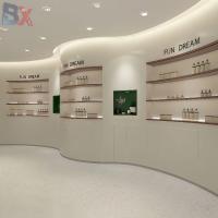 China Custom 3D Design Eco-Friendly Heavy Duty Perfume Display Stand LED Lighting Wooden Fragrance Showcase Retail Stores for sale