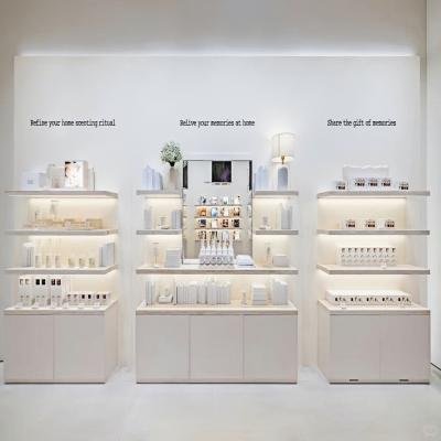 China Professional Perfume Skincare Store Display Furniture Cosmetic Cabinets Stainless Steel Tempered Glass Eco-Friendly Heavy Duty for sale