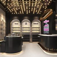 China Modern Cosmetic Shop Furniture Perfume Display Cabinet Glass Showcase for sale