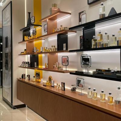 China Designer Glass Showcase for Perfume Boutique Store With Storage Drawers for sale