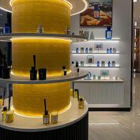 China Designer Glass Showcase for Perfume Boutique Store With Storage Drawers for sale