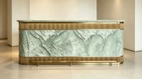 China Freestanding Natural Green Jade Marble Retail Reception Desk with Full Gold Metal Frame for High-End Boutique Stores for sale