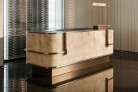 China Luxury Pink Onyx Marble Reception Desk with Bronze Metal Trim and Curved Design for Salon Front Counter for sale