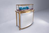 China Wavy Curved Jewelry Showcase Display Rose Gold Jewellery Display Cabinet for sale