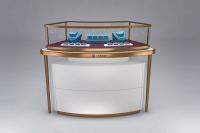 China Wavy Curved Jewelry Showcase Display Rose Gold Jewellery Display Cabinet for sale