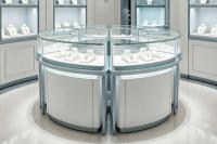 China Pastel Blue Jewelry Counter Display Curved Soft  Jewellery Display Retail for sale