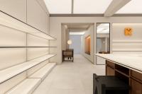 China ream Arch Minimal Women Clothing Store Interior Design | Warm Neutral Ladies Garment Full Shop Layout for sale