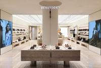 China Full Warm Neutral Minimal Leather Shoe Handbag Store Interior Design for sale