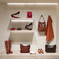 China Full Warm Neutral Minimal Leather Shoe Handbag Store Interior Design for sale