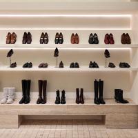 China Full Warm Neutral Minimal Leather Shoe Handbag Store Interior Design for sale