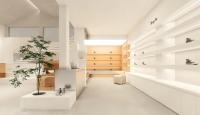 China Warm Pure White Minimal Daily Sneaker Boutique Layout Design for sale