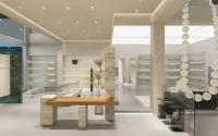 China Warm Neutral Natural Texture Ladies Shoe Shop Design | Minimal Footwear Store Layout for sale