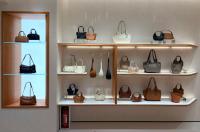 China Curved Wood Backlit Luxury Display Case Ladies Leather Bag Wall Mounted Showcase for sale