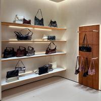 China Curved Wood Backlit Luxury Display Case Ladies Leather Bag Wall Mounted Showcase for sale