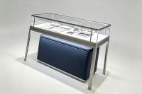 China Light Luxury Rounded Edge Glass Jewelry Display Counter With Storage Cabinet 1200*550*950mm for sale