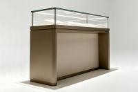 China Modern Rounded Edge Jewelry Display Counter with Tempered Glass and Customizable Dimensions for Boutique Showcase for sale