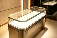 China Custom Curved Tempered Glass Stainless Steel Jewelry Display Counter with Lockable Storage for Luxury Jewelry Stores for sale