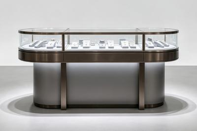 China Custom Oval Tempered Glass Jewelry Island Display Counter with Stainless Steel Frame and LED Lighting for Boutique Jewelry Shop for sale