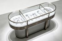 China Custom Oval Tempered Glass Jewelry Island Display Counter with Stainless Steel Frame and LED Lighting for Boutique Jewelry Shop for sale