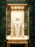 China Tall Pedestal Jewelry Display Cabinet with Four-sided Transparent Glass Stainless Steel Frame and LED Lighting System for sale