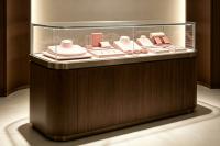 China Walnut Grain Veneer Jewelry Display Counter with Rounded Glass Corners and Built-in LED Lighting for sale