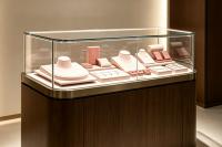 China Walnut Grain Veneer Jewelry Display Counter with Rounded Glass Corners and Built-in LED Lighting for sale