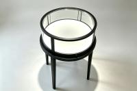 China Minimalist Round Jewelry Display Table with Tempered Glass Showcase and Matte Black Metal Stand Featuring Built-in LED Lighting for sale